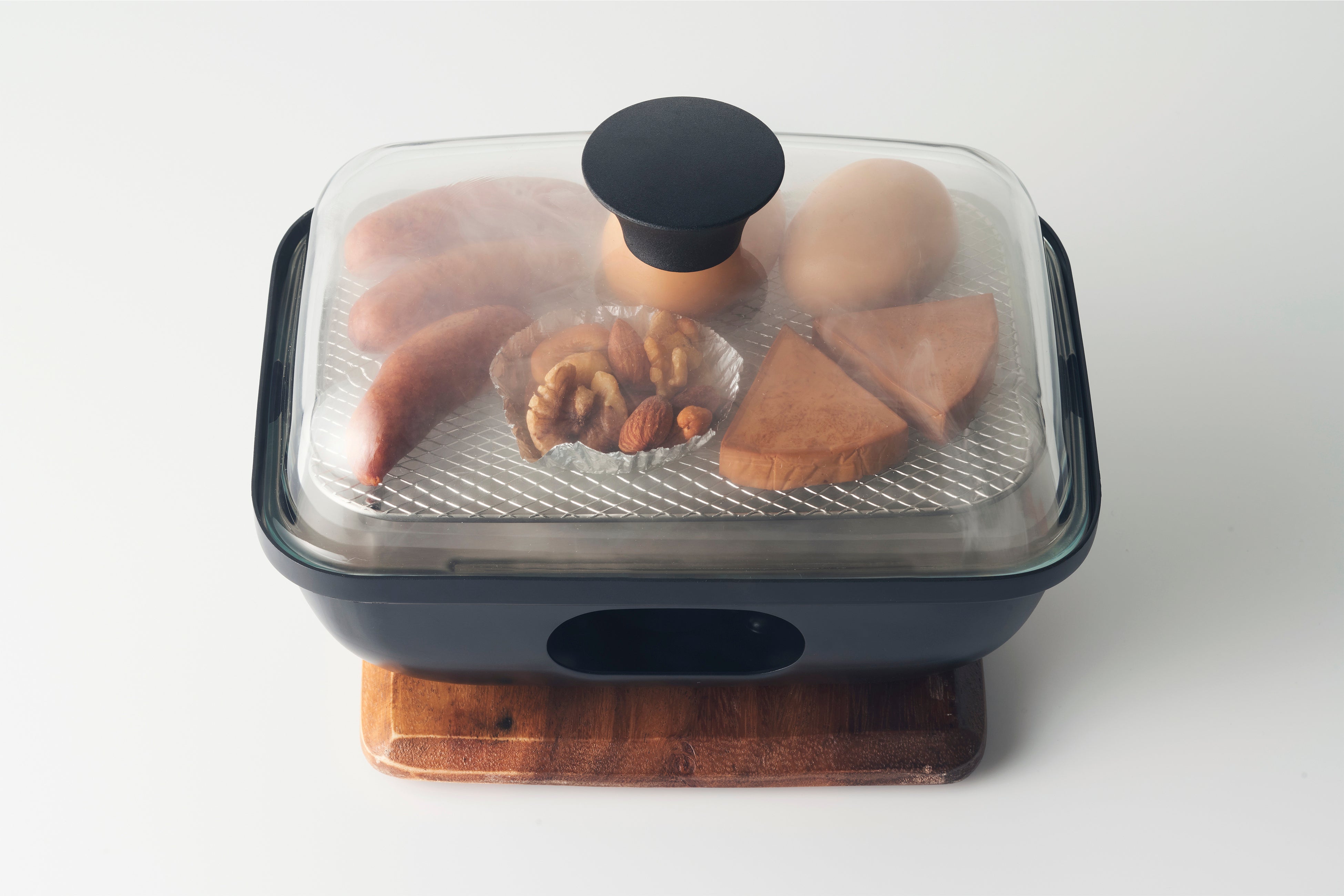 固形燃料で手軽に燻製を楽しめる「クイックスモーカー」がバリエーションも増えリニューアル発売 | 株式会社ドウシシャのプレスリリース